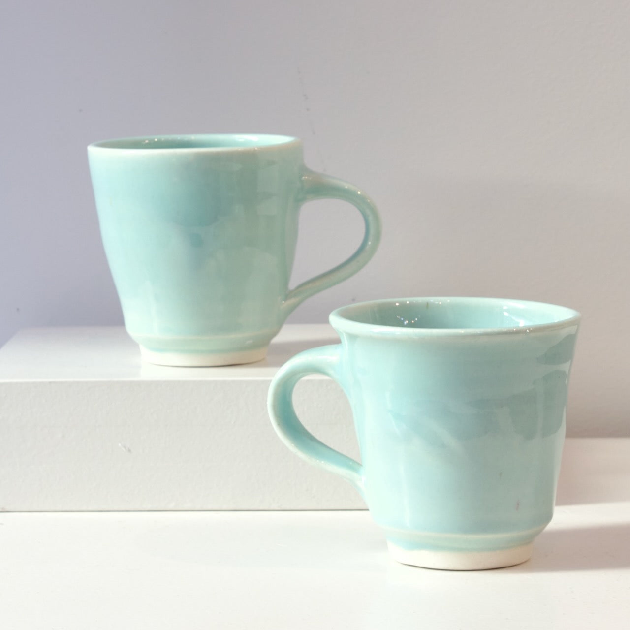 JLA: Pale blue mugs – Quadrant Gallery